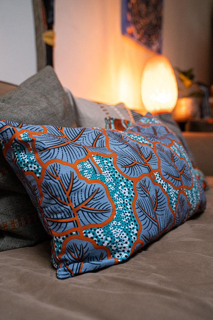 Mayamiko | Rectangular cushion cover in blue and orange abstract print